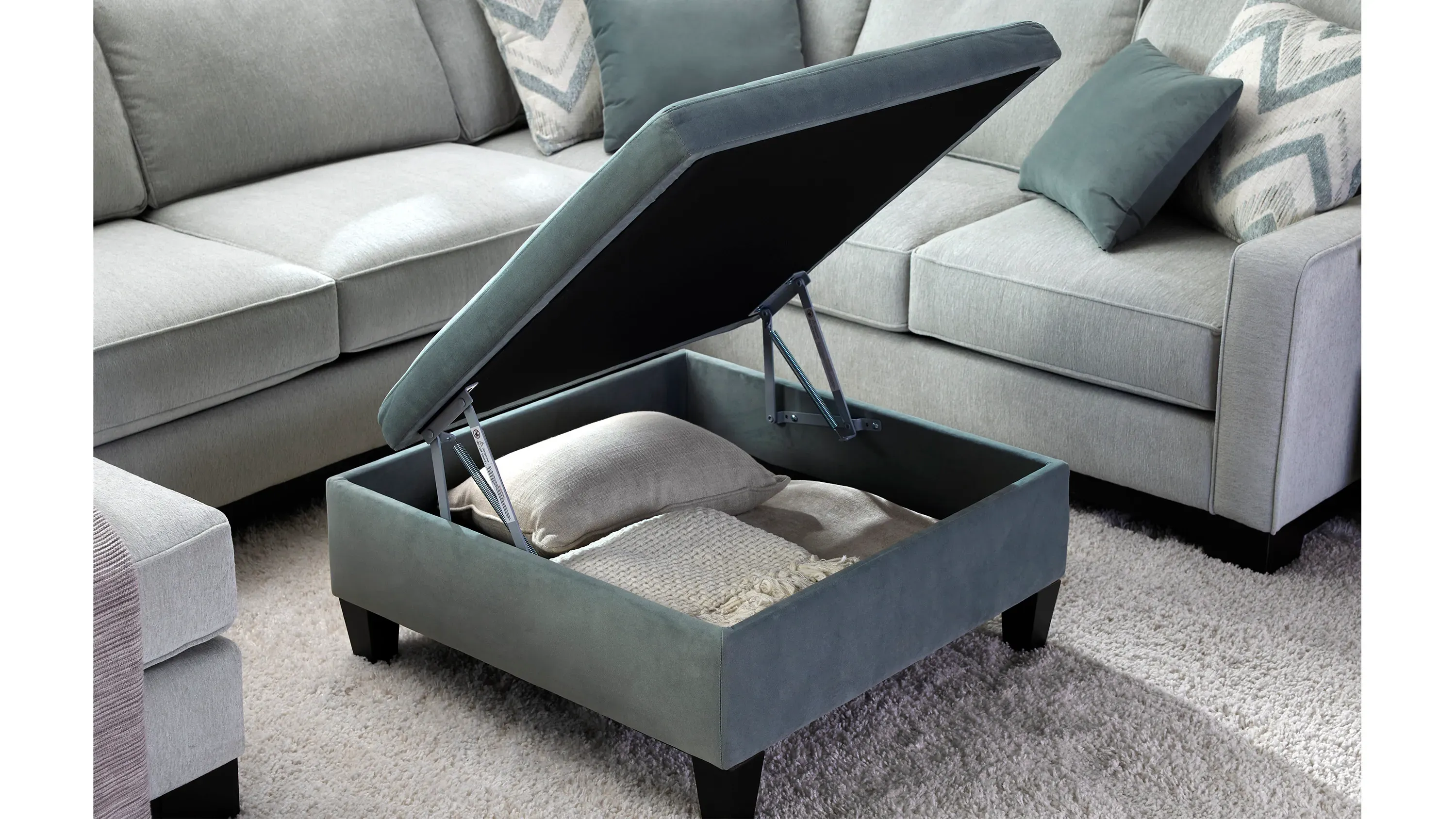 Arlo Storage Ottoman in Blue by Jonathan Louis
