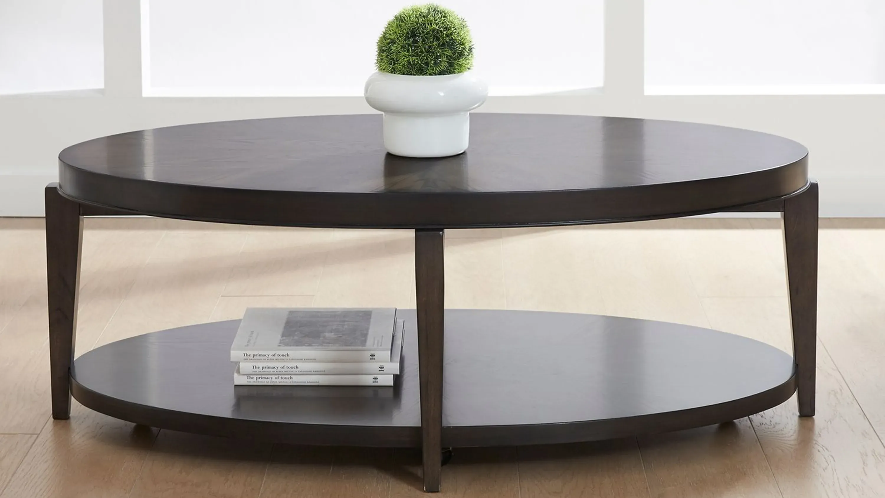 Penton Oval Cocktail Table w/ Casters | Raymour & Flanigan